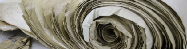 Handling rolled maps and paper bundles - The National Archives